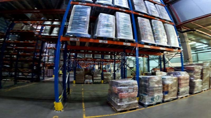 Very Large Warehouse with High Shelves. ILarge Warehouse with Goods ...
