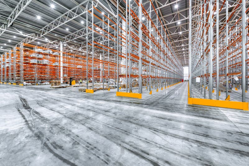 Large Warehouse. Tall and Long Metal Racks Filled with Various Boxes ...