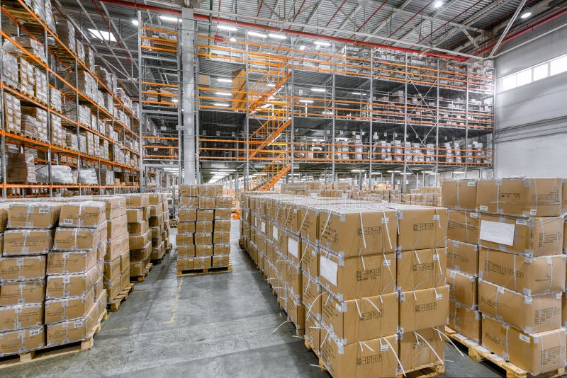 Large Warehouse. Tall and Long Metal Racks Filled with Various Boxes ...