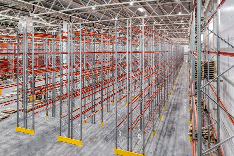 Large Warehouse. Tall and Long Metal Shelving Stock Image - Image of ...