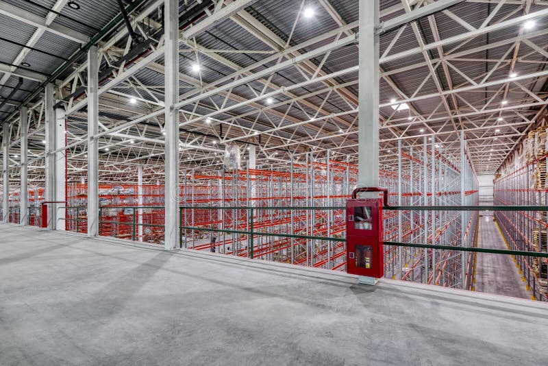 Large Warehouse. Tall and Long Metal Shelving Stock Photo - Image of ...