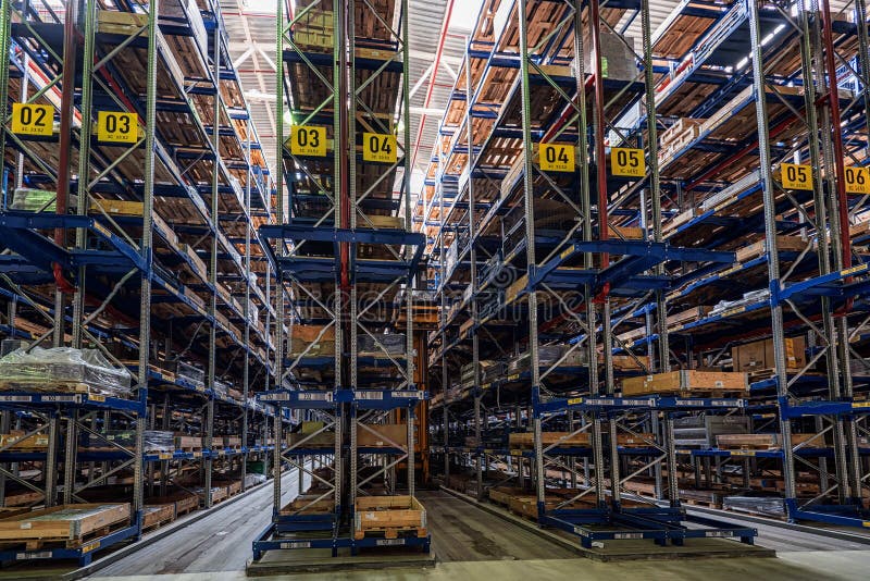 Large Warehouse with Tiered Storage Stock Photo - Image of container ...