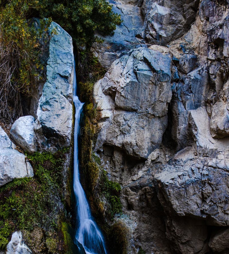 A Large Waterfall Over a Rocky Cliff Stock Image - Image of outdoors ...