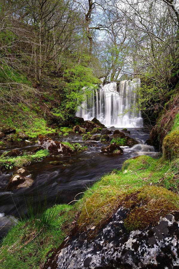 Large Waterfall stock image. Image of trees, water, boulders - 53868709