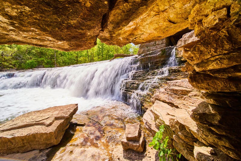 Large Waterfall View from Inside Small Rock Cave Opening Stock Image ...