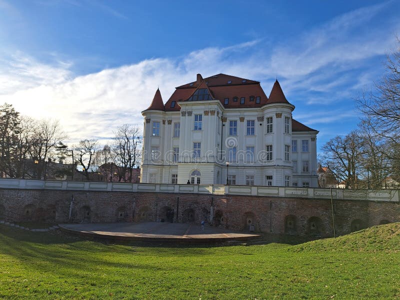 Large White House Sits Atop a Hill Overlooking the Water Editorial ...