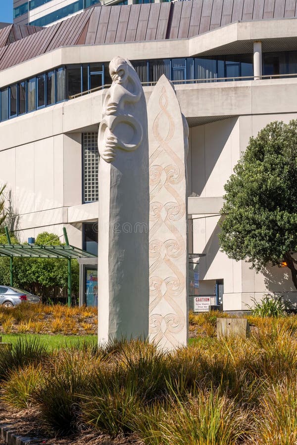 Large White Maori Totem Sculpture in Front of a Building in the Park ...