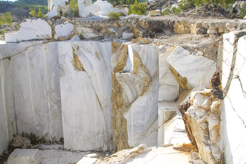 Large White Marble Stones in an Old Abandoned Quarry. White Marble ...