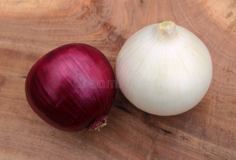 A Large White Onion Next To a Medium Red Onion Stock Image - Image of ...