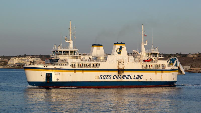 Large, White Passenger Ferry Navigating through the Blue Waters of ...