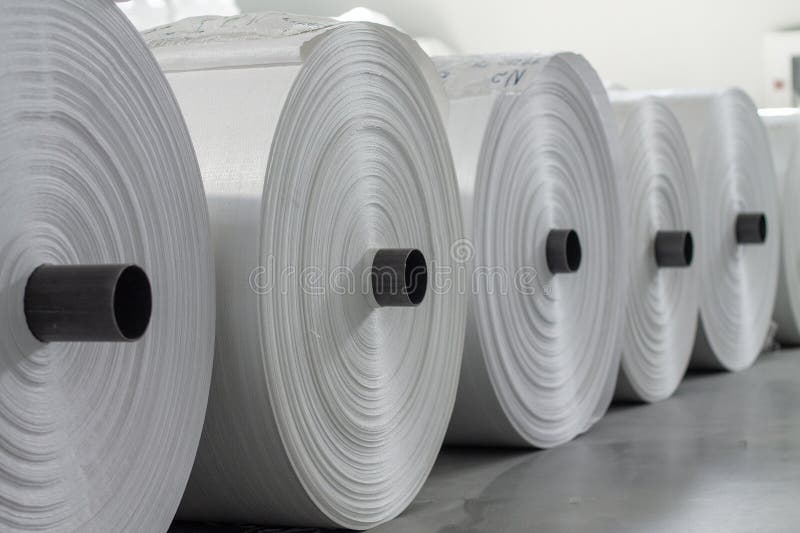 A Warehouse with Large White Rolls of Polypropylene. Stock Photo ...