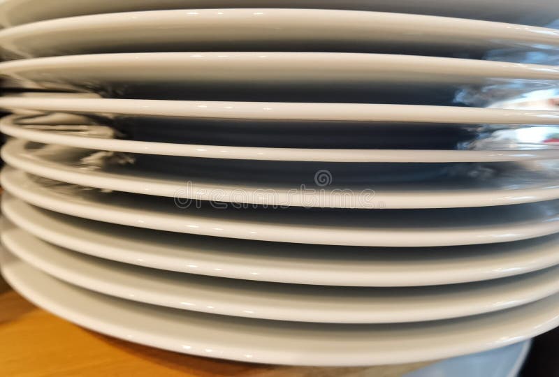 Large White Serving Plates Stacked Up Stock Image - Image of table ...