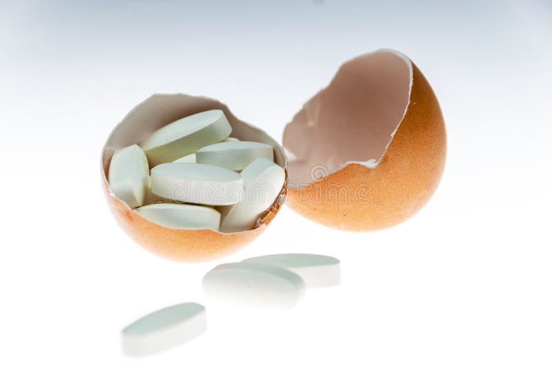 Large White Tablets in an Eggshell Stock Image - Image of medicine ...
