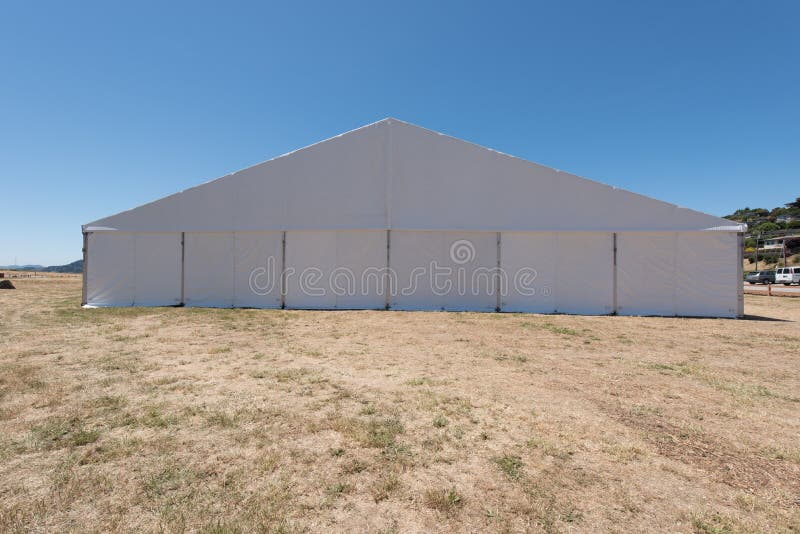 Large White Tent for Entertaining in Field Stock Photo - Image of hire ...