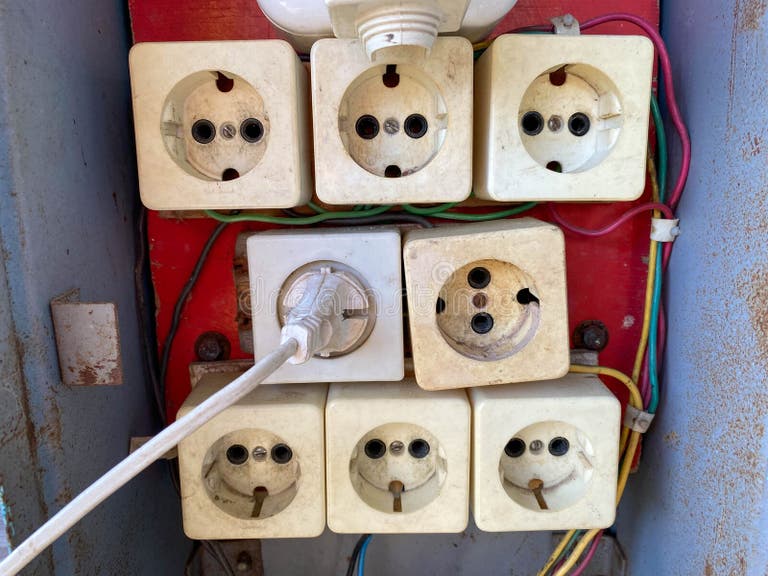 Large White Unprofessionally Installed Many Square Electrical Outlets ...