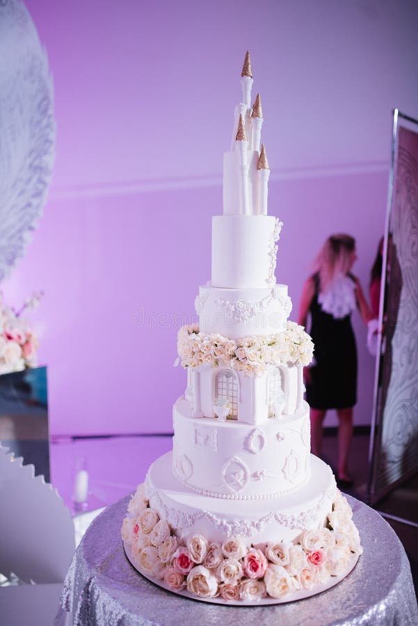 Large White Wedding Cake with Castle Shaped Towers Stock Image - Image ...
