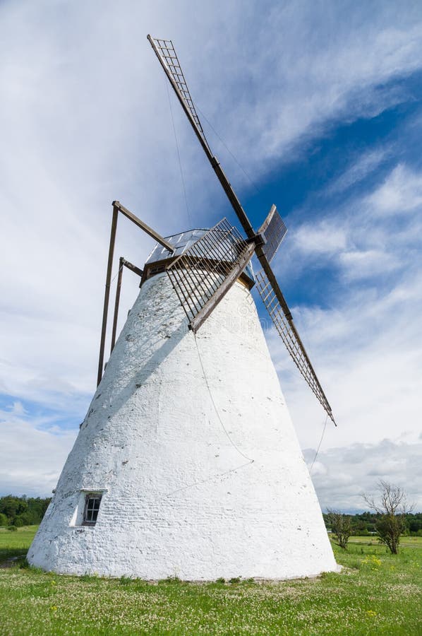 Large White Windmill Under Blue Sky Stock Image - Image of green, blue ...