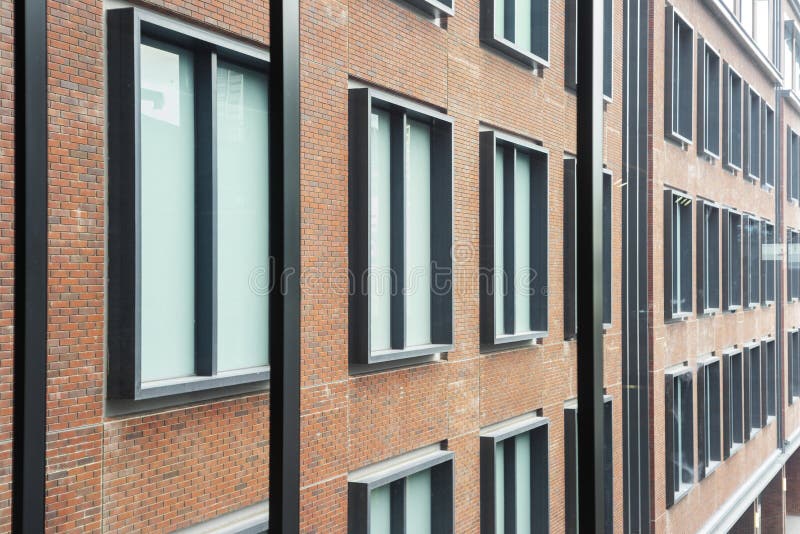 Large Windows in a Red Brick Wall Building Stock Image - Image of ...