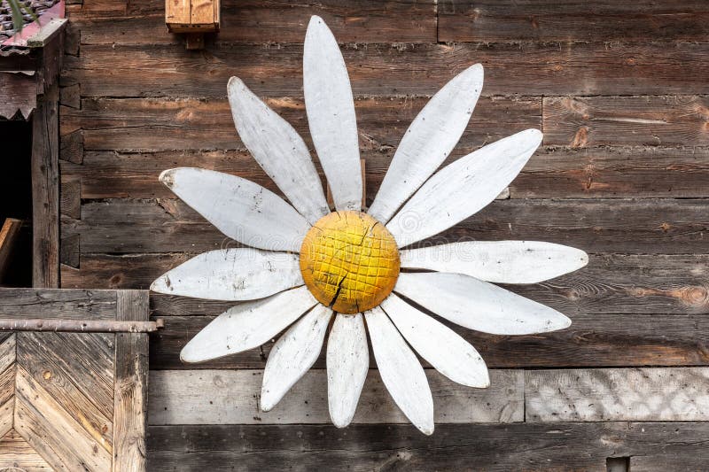 Large Wooden Daisy Hangs on the Barn Wall Stock Image - Image of daisy ...