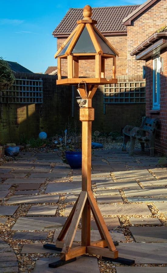 Large Wooden Garden Bird Table Stock Image - Image of paving, simple ...