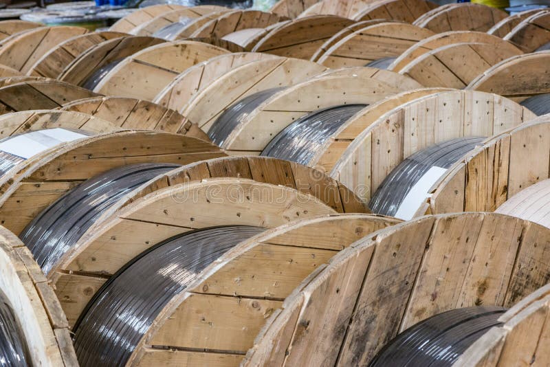 Large Wooden Spools with Cable Inside of the Plant Stock Photo - Image ...
