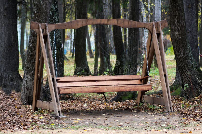 Large Wooden Swing in the Forest Stock Photo - Image of ancient ...