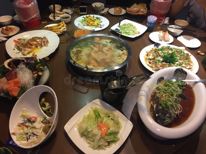 Large Wooden Table Filled with Various Dishes Stock Image - Image of ...