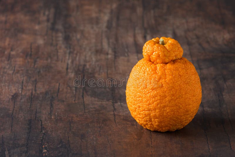 Large, Wrinkled, Fresh Orange on a Rustic Background, Ready To Peel ...