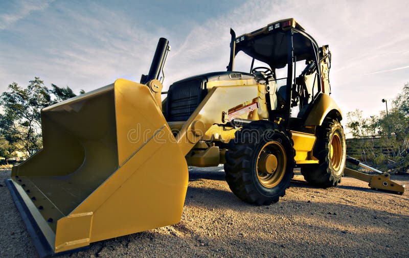 Yellow bulldozer-excavator stock photo. Image of industry - 19738894