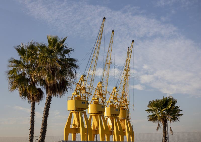 Large Yellow Cranes in Loading Docks Stock Photo - Image of shipping ...