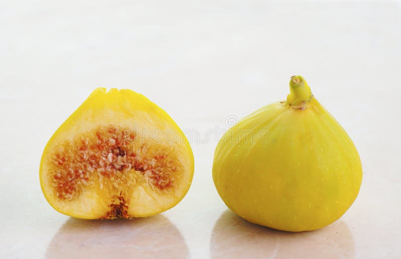 A Large Yellow Fig is Cut into Slices Stock Photo - Image of large ...