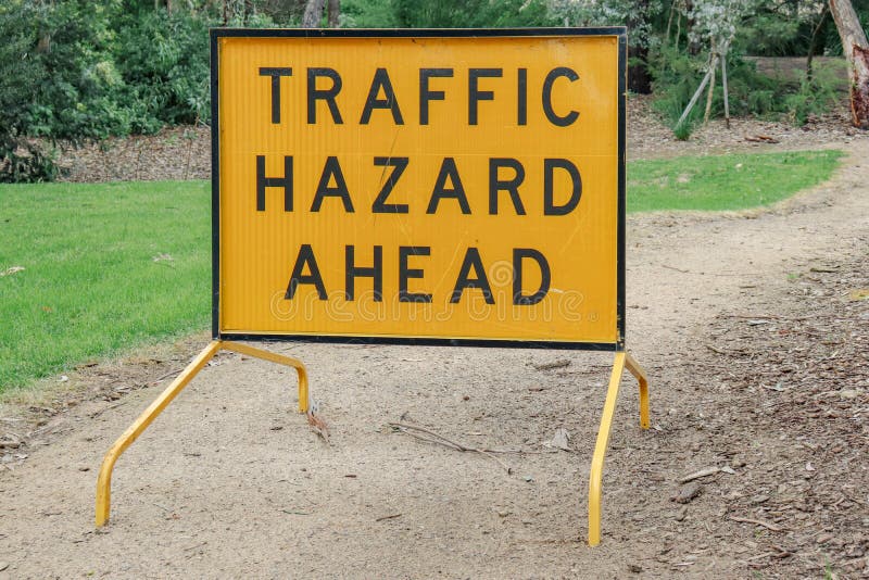 Large Yellow TRAFFIC HAZAR AHEAD Sign on a Path Stock Photo - Image of ...