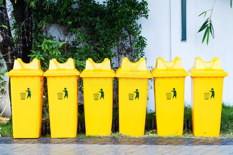 Large Yellow Trash Bin Placed 6 Side Stock Image - Image of paper ...