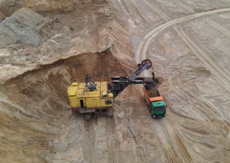 Largest Mining Excavator With Electric Shovel Loading Sand Into Dump