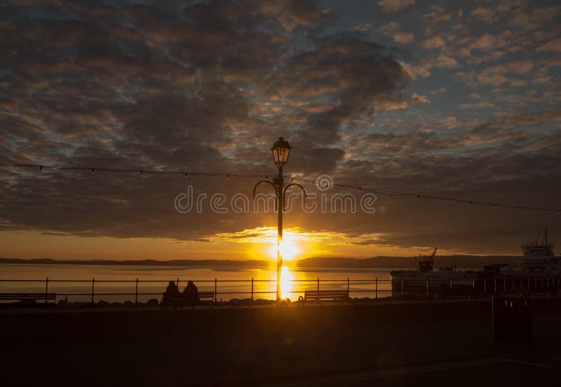 Largs sunset editorial photography. Image of watching - 43780482