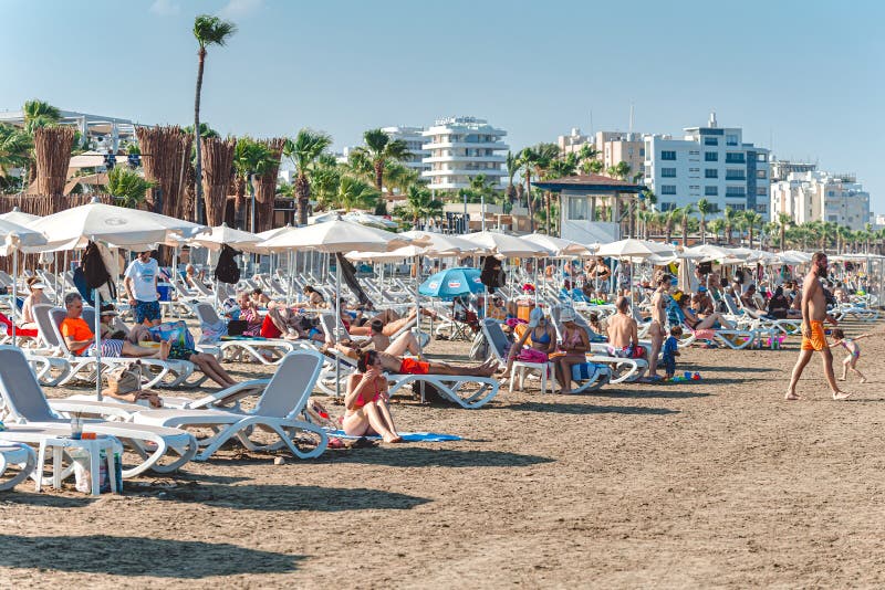 Larnaca, Cyprus - July 09, 2022: Tourists Sunbathing at Mackenzie Beach ...