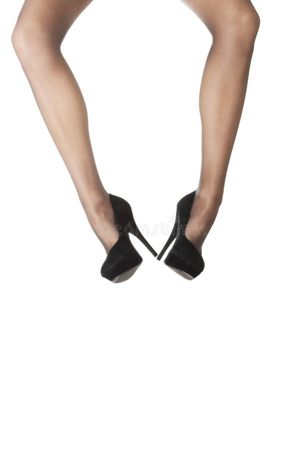 Las Piernas De La Mujer Larga Hermosa En Medias Y Tacones Altos Negros