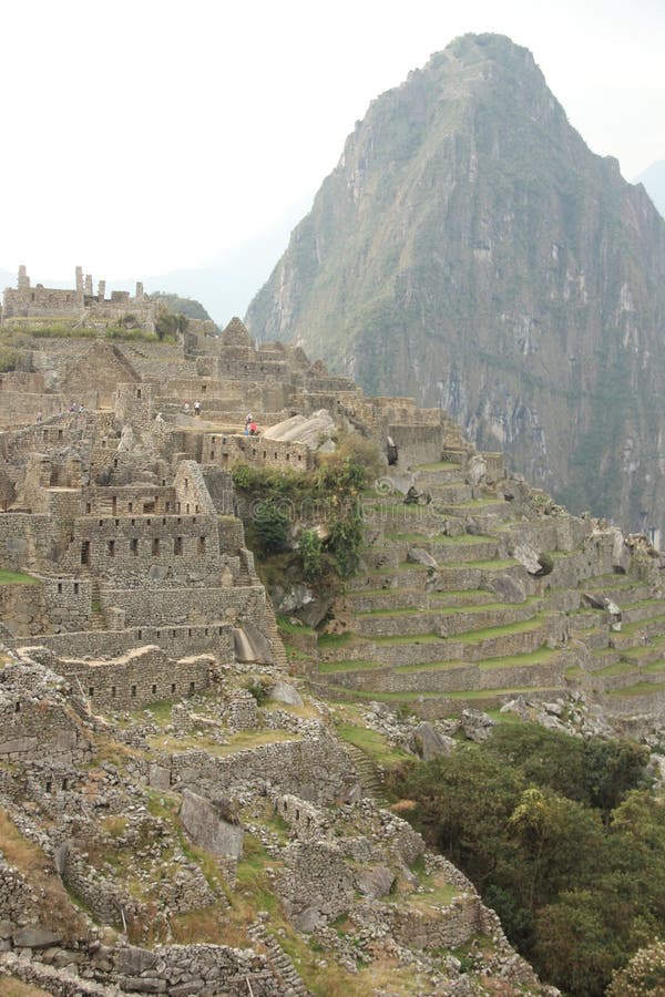 Las ruinas de Machu Picchu foto de archivo. Imagen de herencia - 131701316