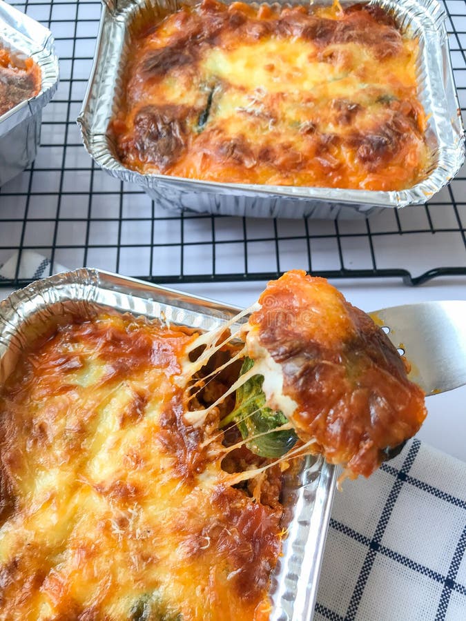Lasagna in foil container stock image. Image of convenience - 16634557