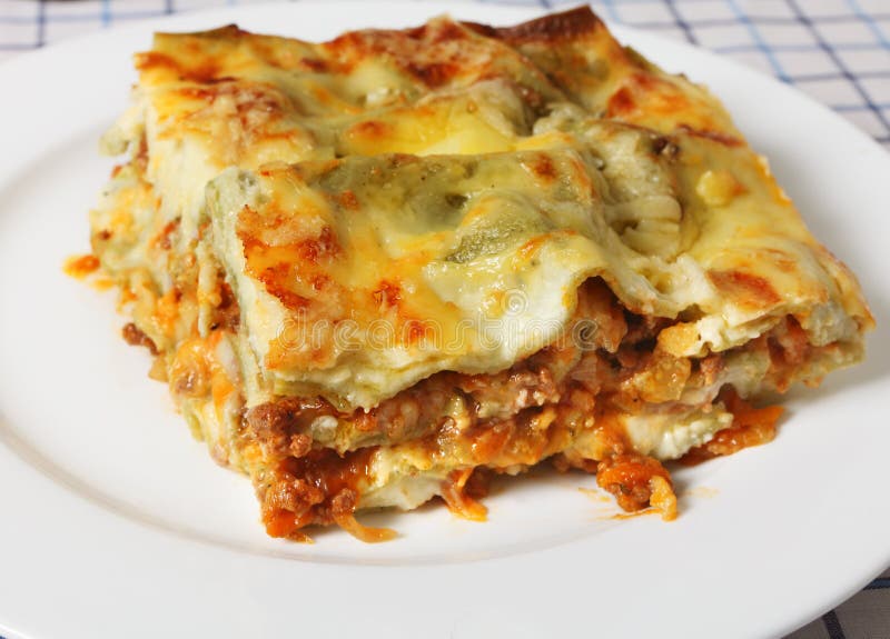 Lasagne verde slice stock image. Image of verde, plate - 24483439