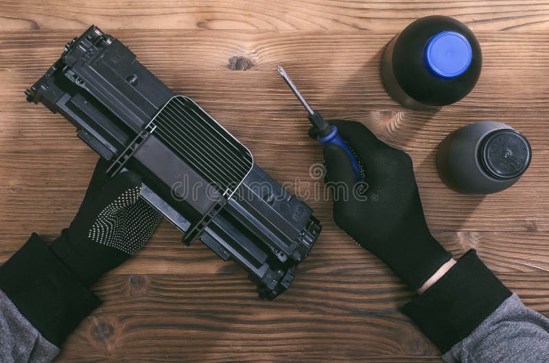 Laser cartridge refilling. stock photo. Image of refilling - 132313650