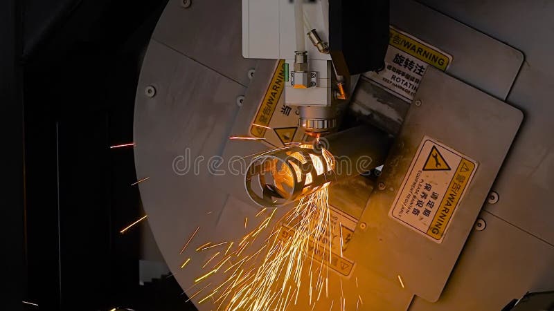 Laser Cutting Machine is Operating on Metal Workpiece with Sparks ...