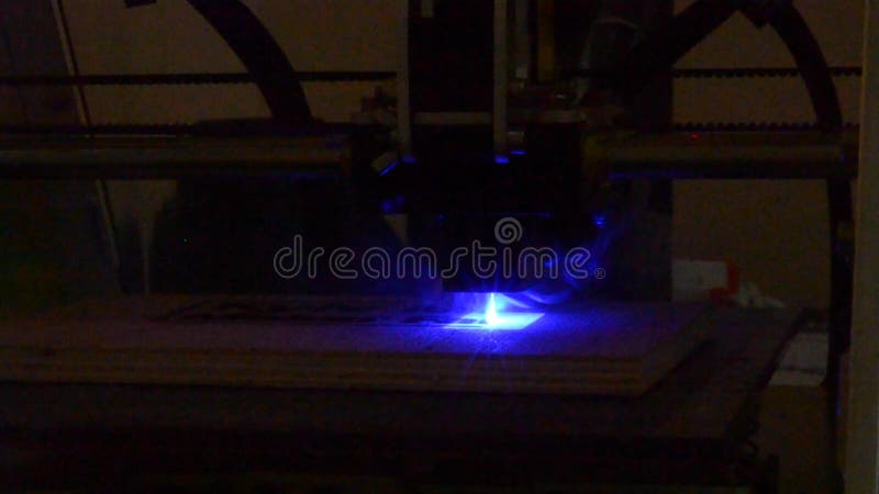 Laser Engraving on Wood. 3D Printer Laser Beam Burns the Pattern Stock ...