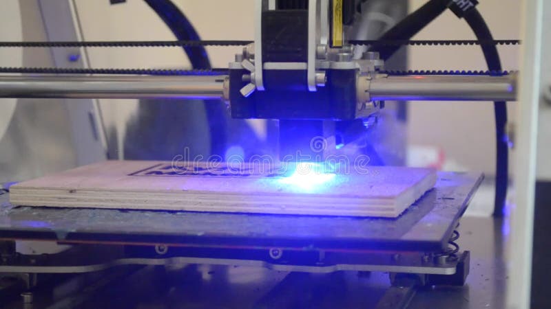 Laser Engraving on Wood. 3D Printer Laser Beam Burns the Pattern Stock ...