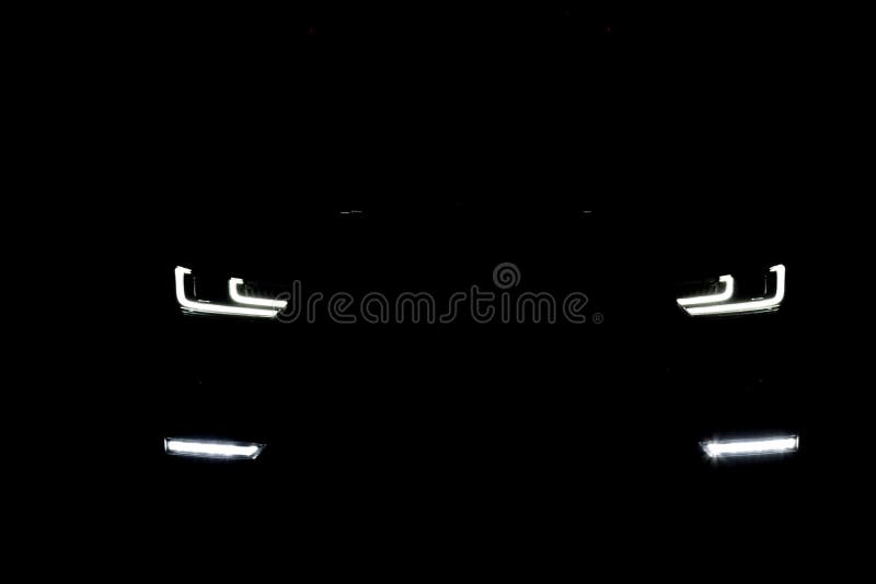 Laser Headlights and Fog Lights of a Modern Car Glow in the Dark ...