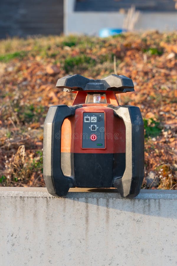 A Laser Level Actively Measuring on a Land Plot, Ensuring Precise ...