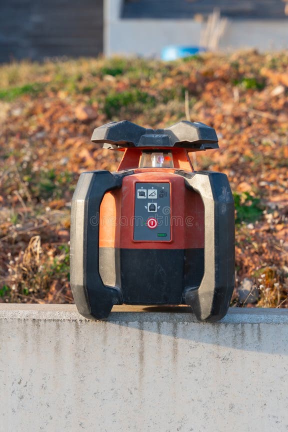 A Laser Level Actively Measuring on a Land Plot, Ensuring Precise ...
