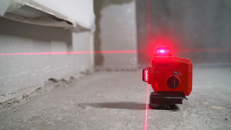 Laser Level at Work. Laser Level and Concrete Walls and Floor ...