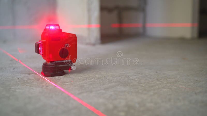 Laser Level at Work. Laser Level and Concrete Walls and Floor ...