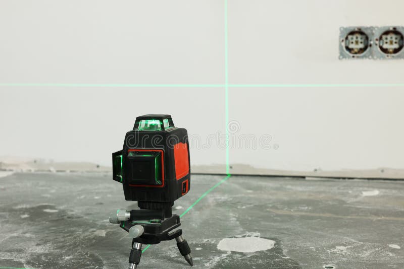 Laser Level on Floor Near Electrical Sockets Stock Image - Image of ...